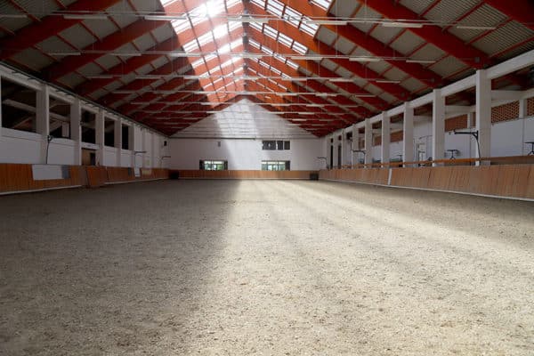Guide to Horse Arena Sand Types & Installation | Performance Footing